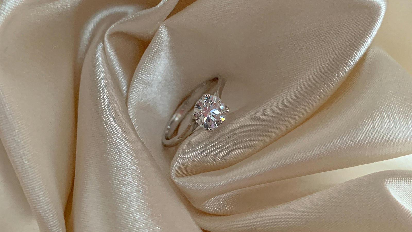 How to Wear an Engagement Ring and a Wedding Band Without Getting It Wrong